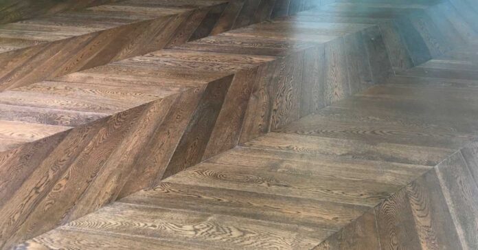 Laminate and Wood Chevron Pattern Flooring Installation at Home