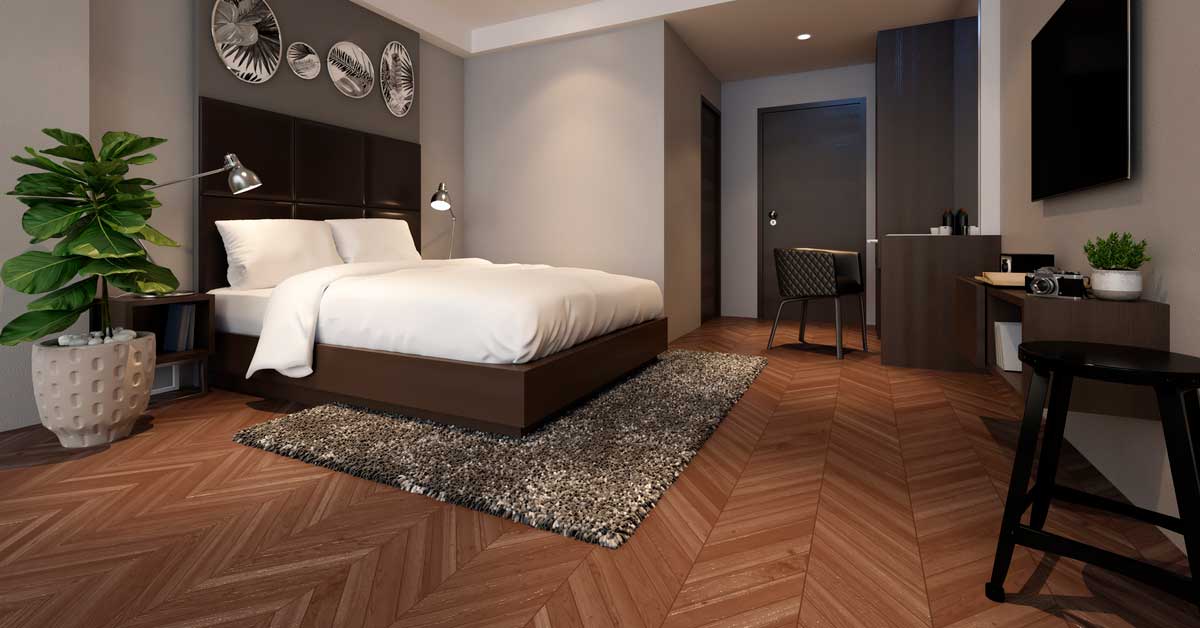Laminate and Wood Chevron Pattern Flooring Installation at Home